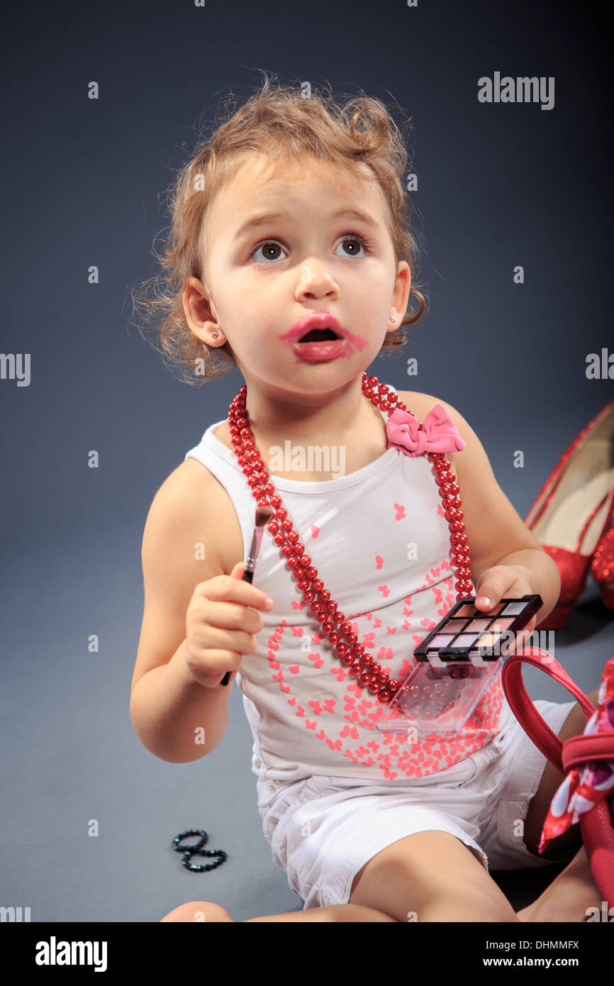 Little girl making hi-res stock photography and images - Alamy