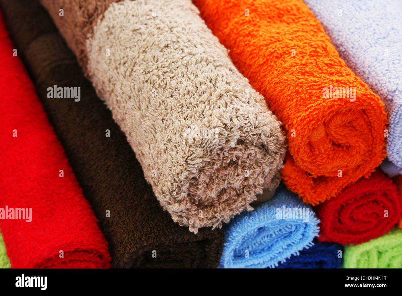 Colorful towels as a background Stock Photo - Alamy