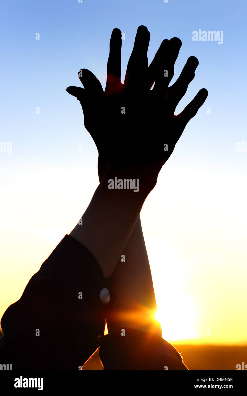 Light through hands hi-res stock photography and images - Alamy
