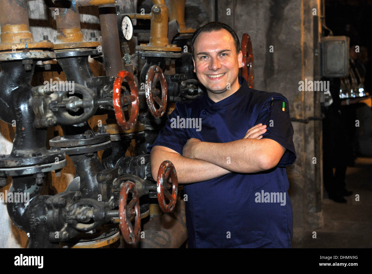 Berlin, Germany. 11th Nov, 2013. Award-winning chef Tim Raue poses at ...