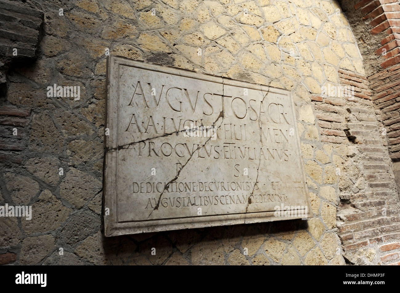 Latin inscription on a wall in Herculaneum Stock Photo - Alamy