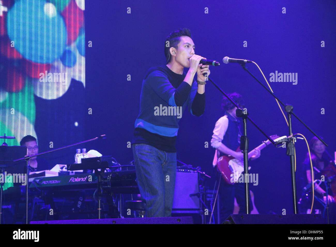 Taipei, China. 8th Nov, 2013. Singer Yoga Lin performs at his charity ...