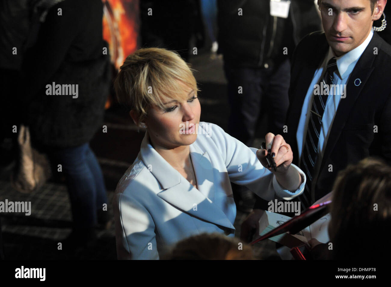 Berlin, Germany. 12th Nov, 2013. US actress Jennifer Lawrence signs ...