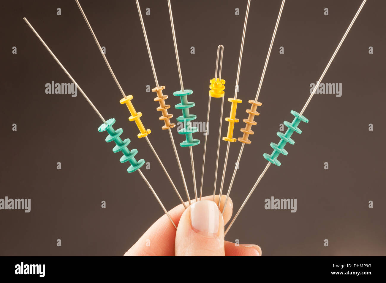Resistor electronics part hand hi-res stock photography and images - Alamy