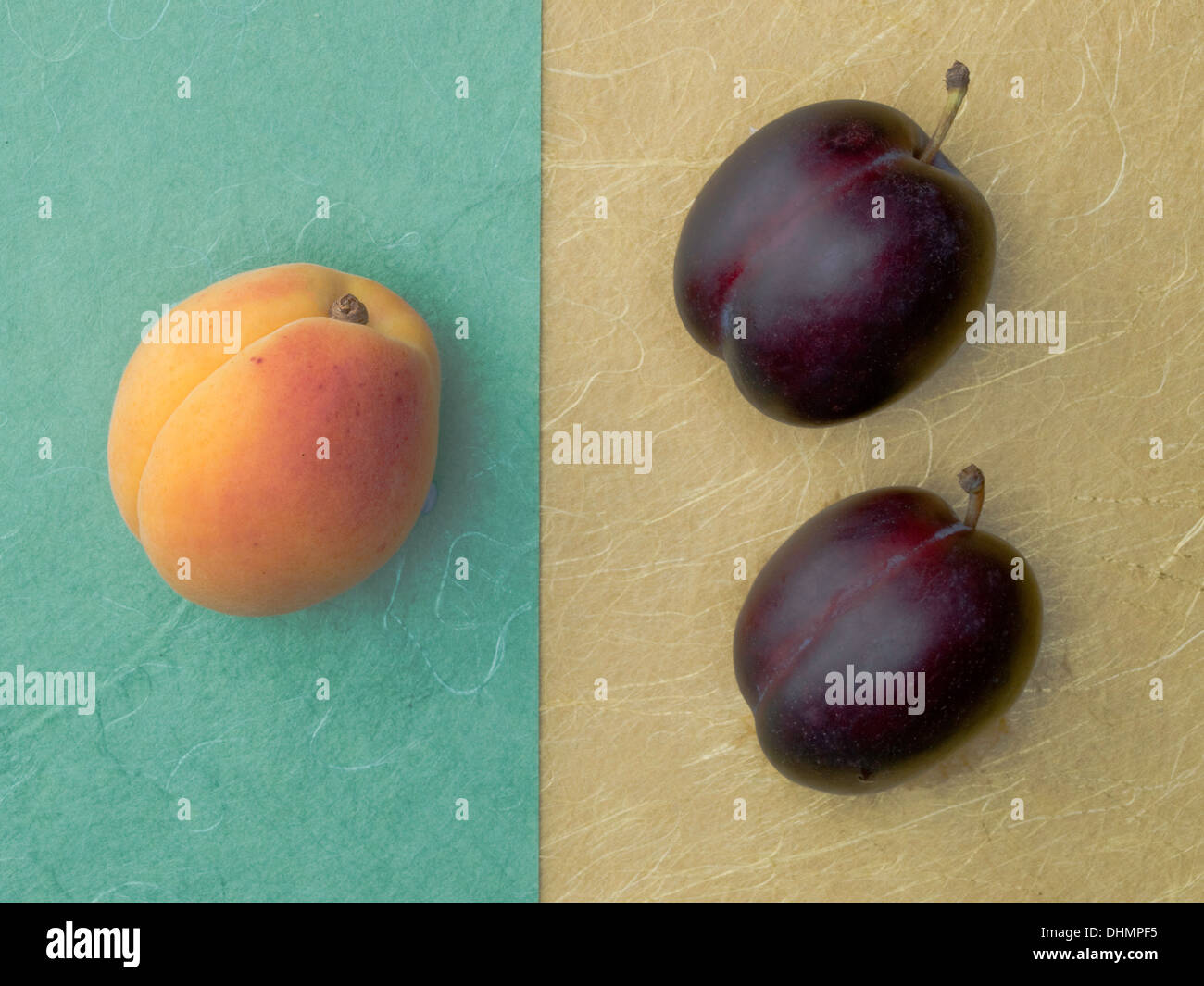 Fruit on contrasting coloured backgrounds Stock Photo - Alamy