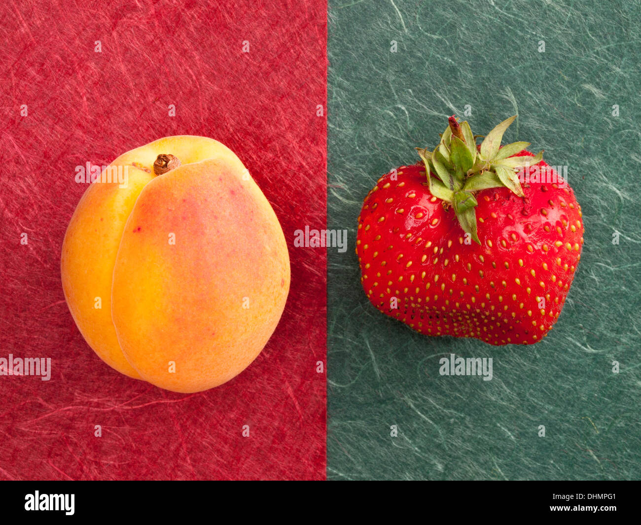 Fruit on contrasting coloured backgrounds Stock Photo - Alamy