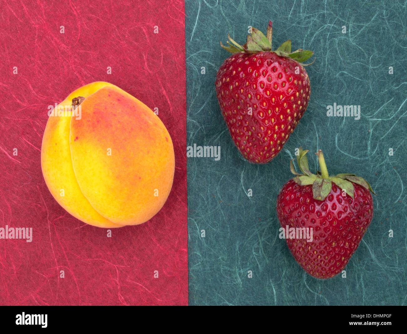 Fruit on contrasting coloured backgrounds Stock Photo - Alamy