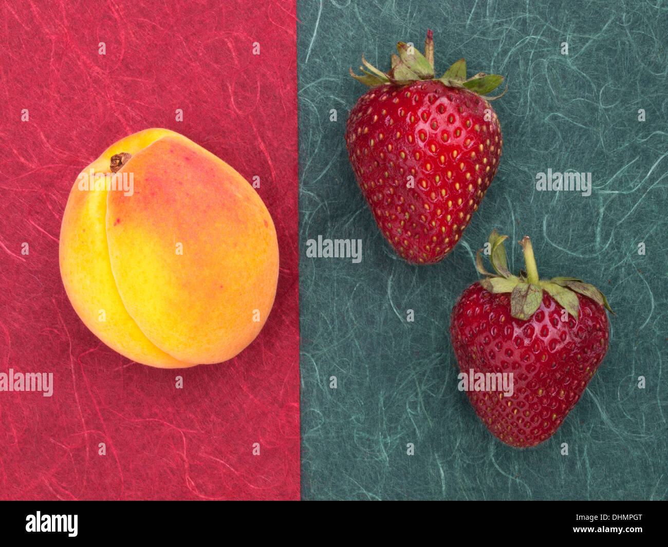 Fruit on contrasting coloured backgrounds Stock Photo - Alamy