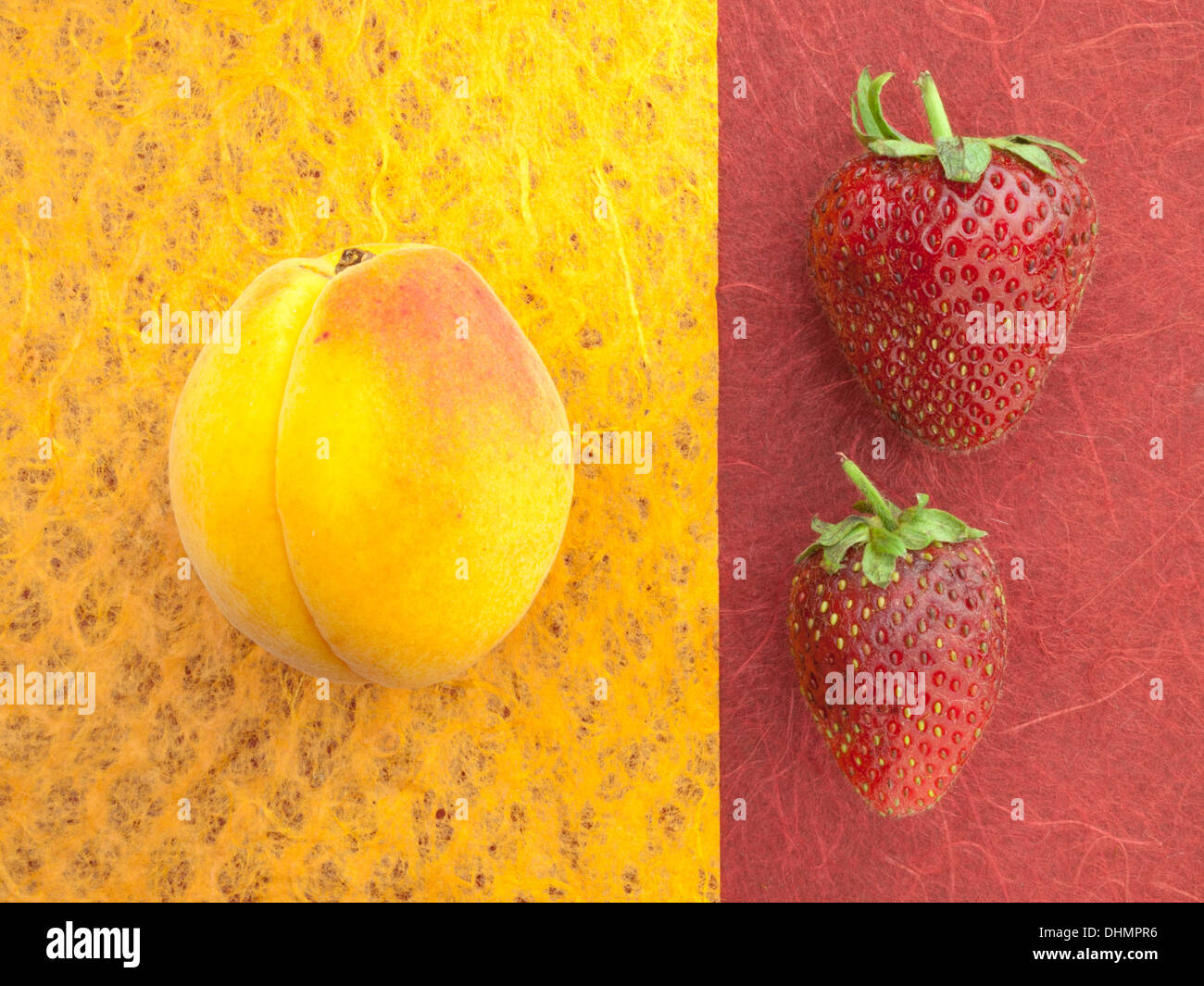 Fruit on contrasting coloured backgrounds Stock Photo - Alamy