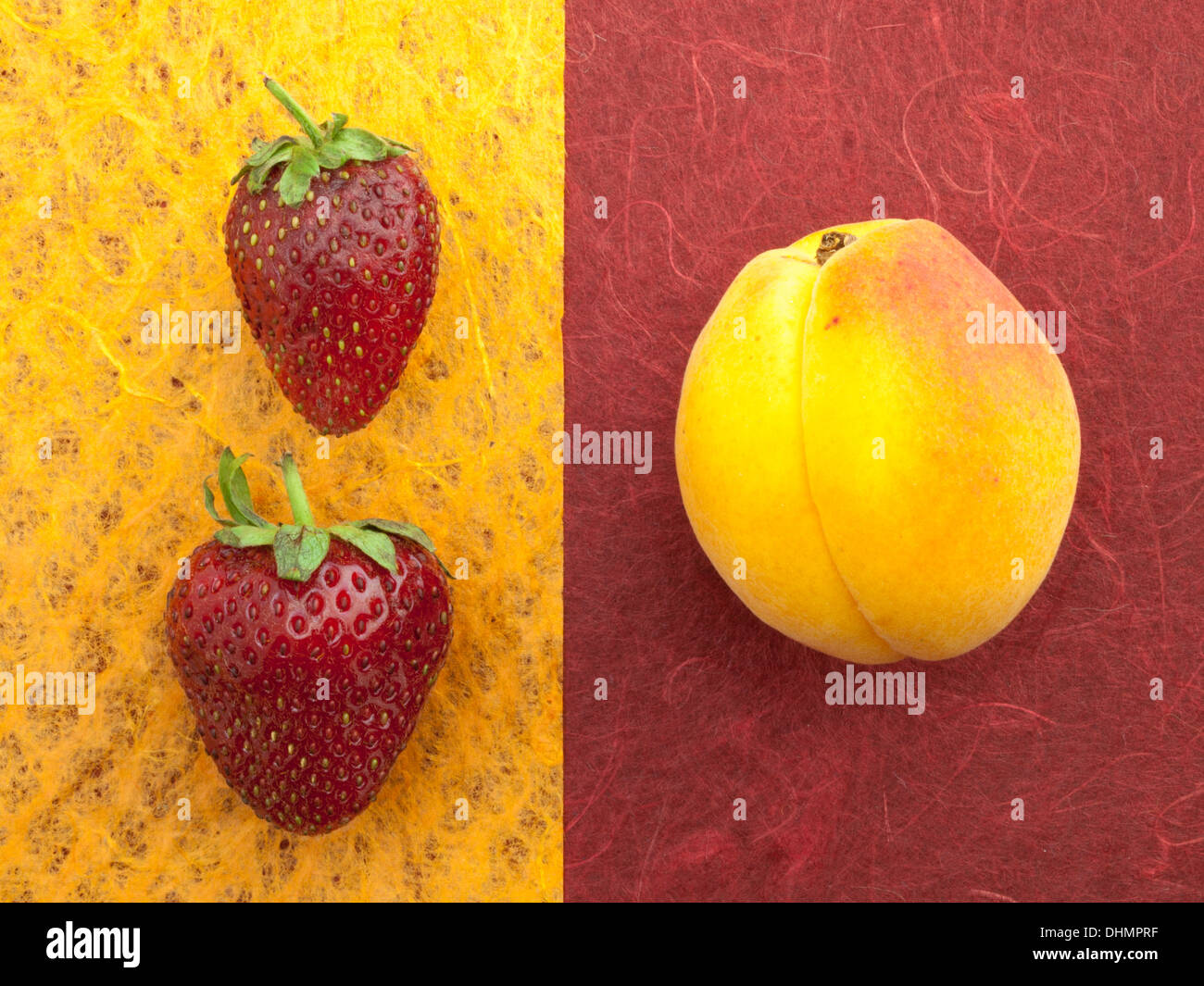 Fruit on contrasting coloured backgrounds Stock Photo - Alamy