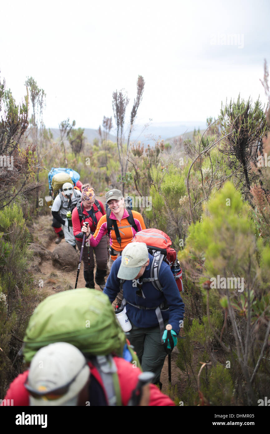Nov. 1, 2013 - Tanzania - Hikers along with their porters make the ...