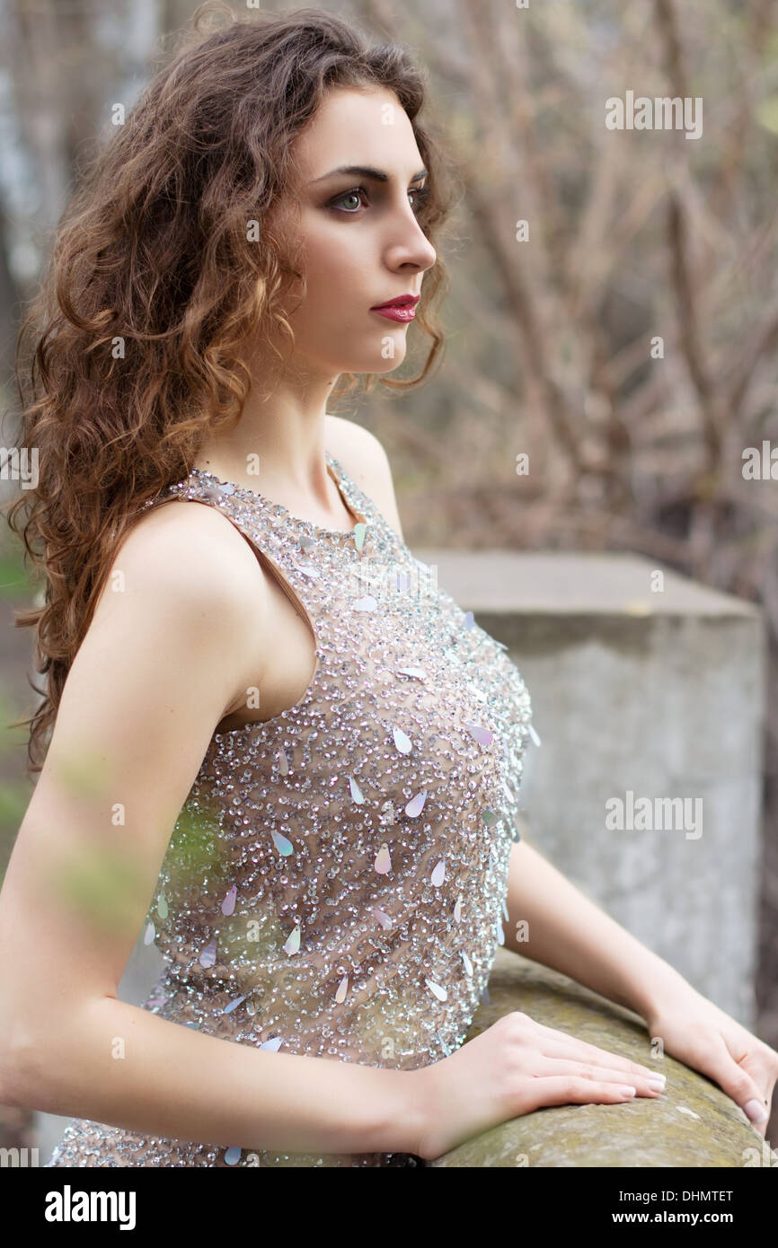 Alluring curly lady Stock Photo - Alamy