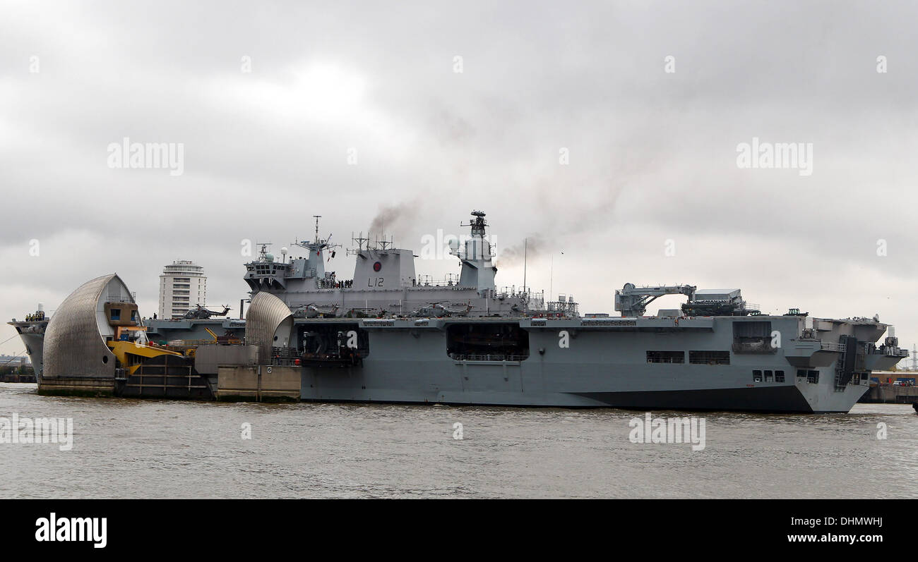 The HMS Ocean arrives in London through the Thames barrier. The ...
