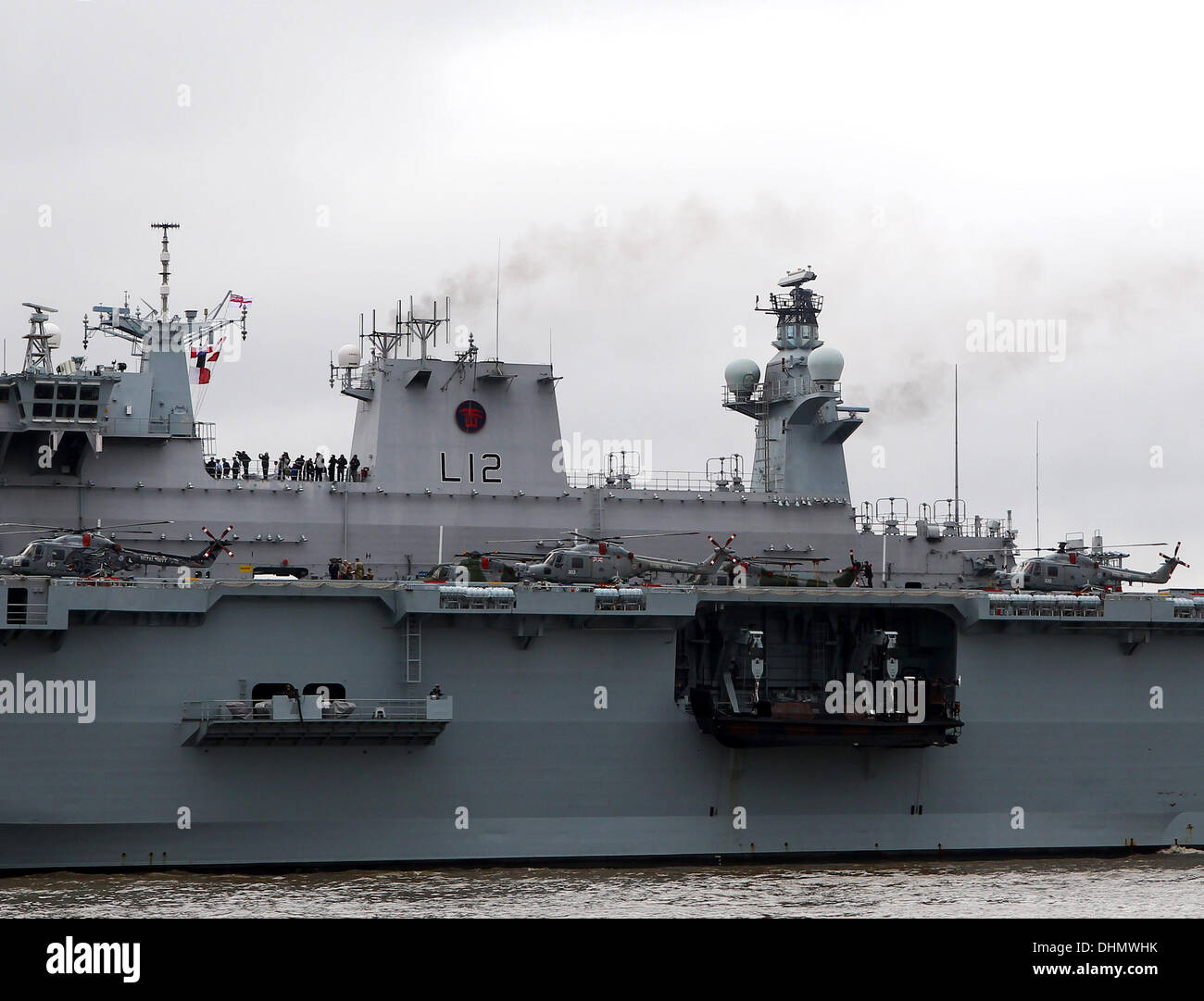 The HMS Ocean arrives in London through the Thames barrier. The ...