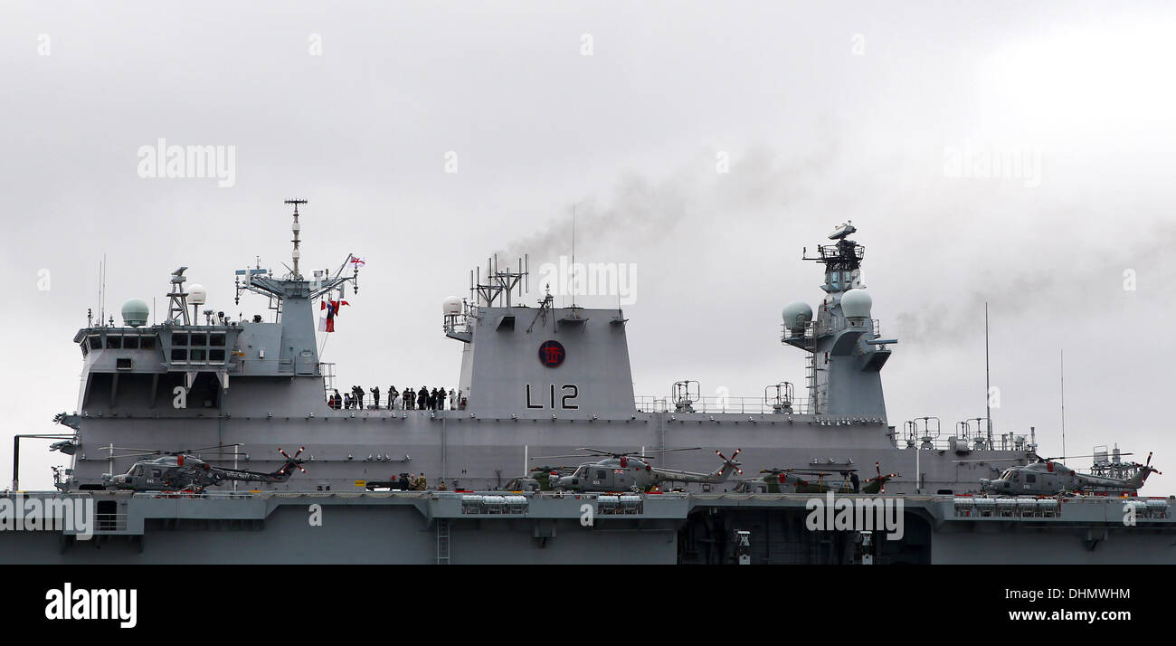 The HMS Ocean arrives in London through the Thames barrier. The ...