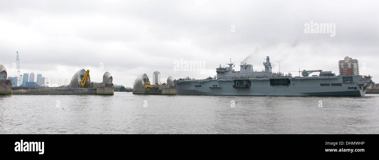 The HMS Ocean arrives in London through the Thames barrier. The ...