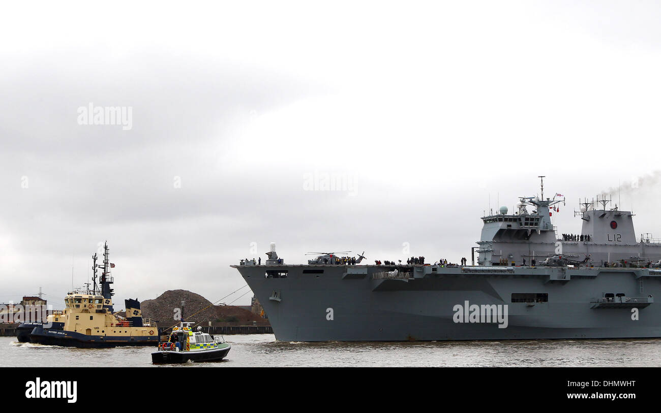 The HMS Ocean arrives in London through the Thames barrier. The ...