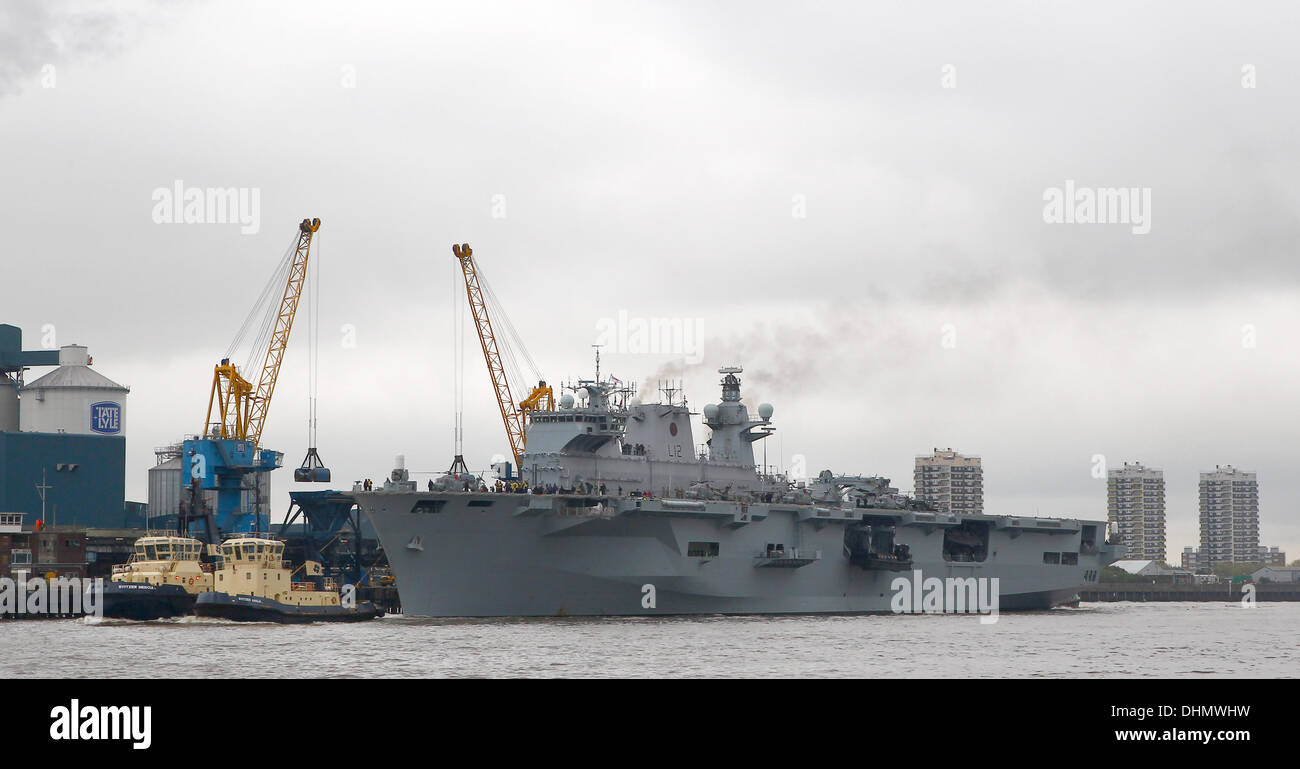 The HMS Ocean arrives in London through the Thames barrier. The ...