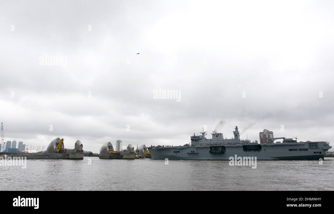 The HMS Ocean arrives in London through the Thames barrier. The ...