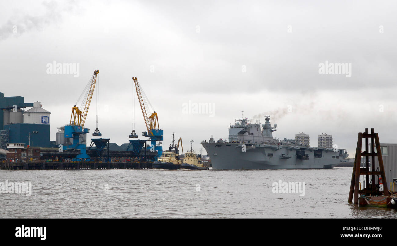 The HMS Ocean arrives in London through the Thames barrier. The ...