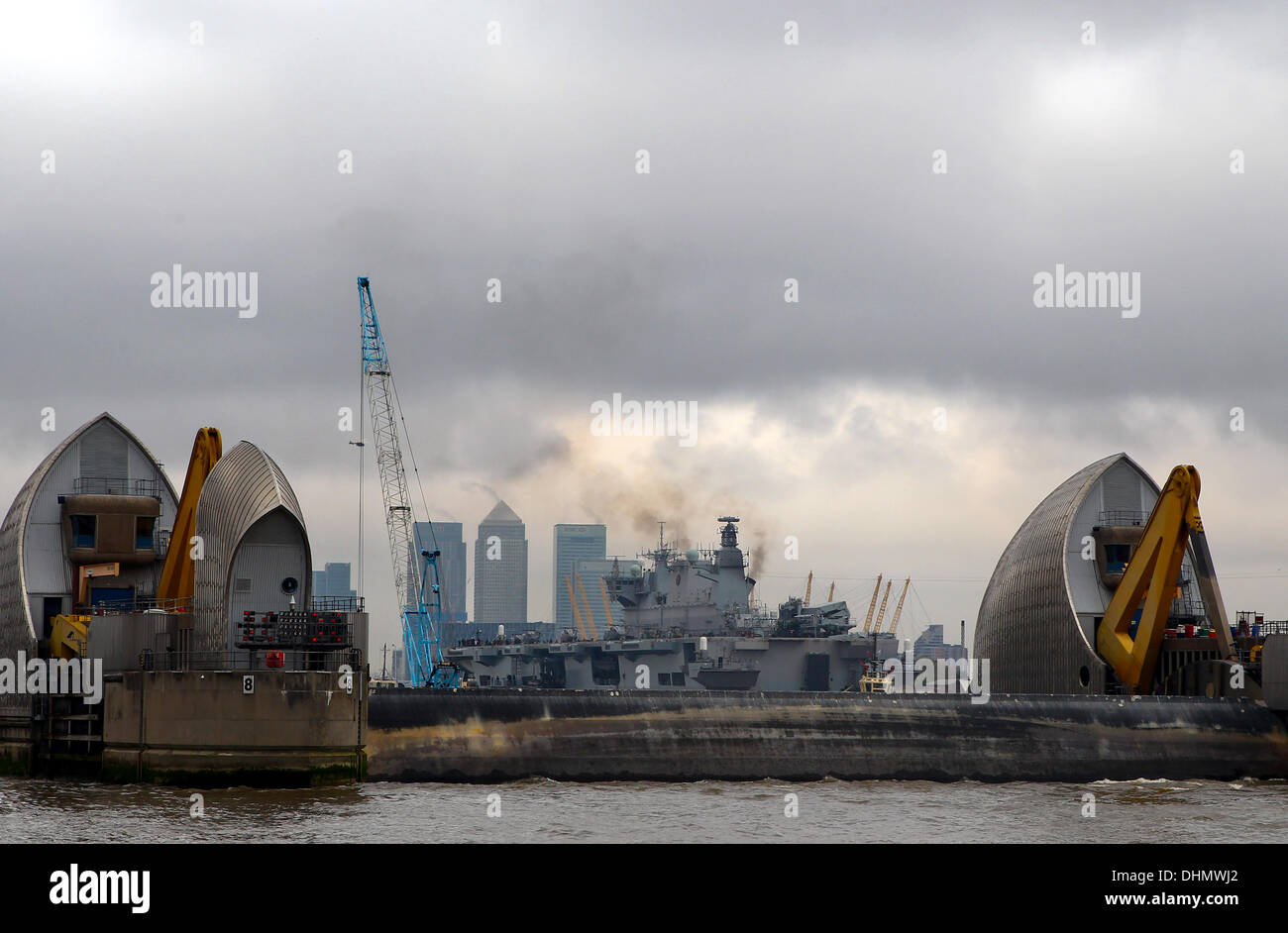 The HMS Ocean arrives in London through the Thames barrier. The ...