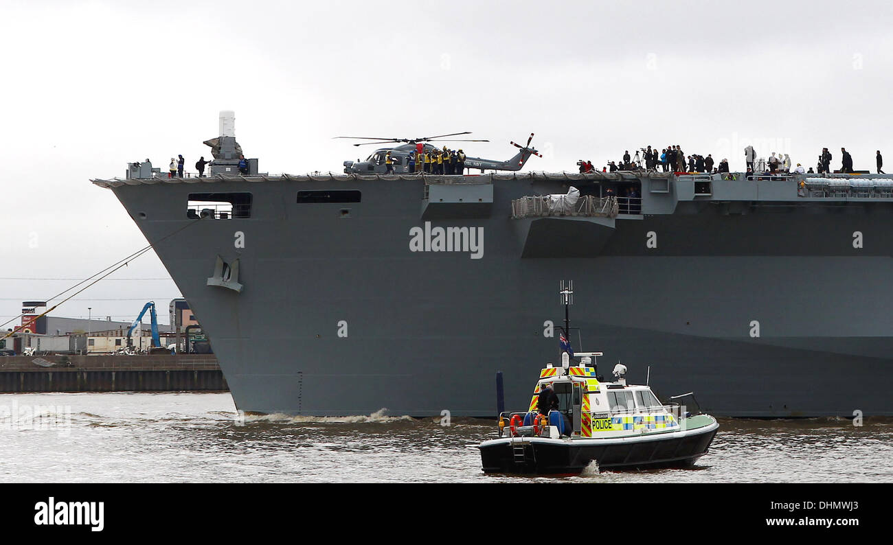 The HMS Ocean arrives in London through the Thames barrier. The ...