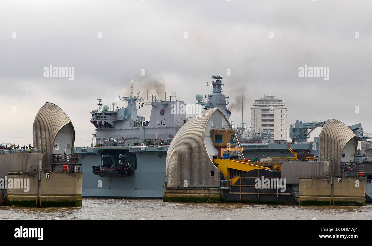 The HMS Ocean arrives in London through the Thames barrier. The ...