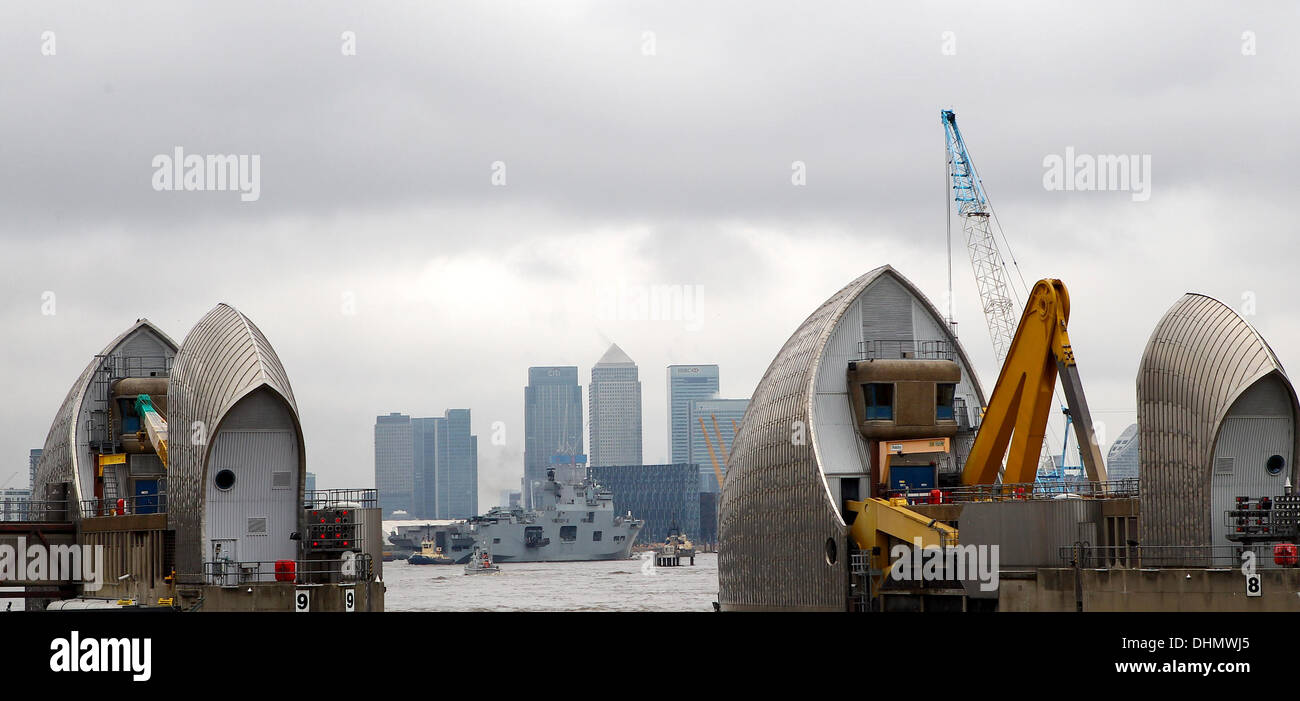 The HMS Ocean arrives in London through the Thames barrier. The ...