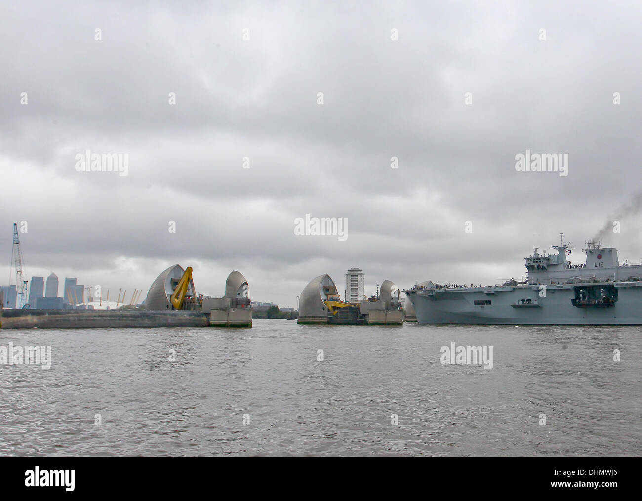 The HMS Ocean arrives in London through the Thames barrier. The ...