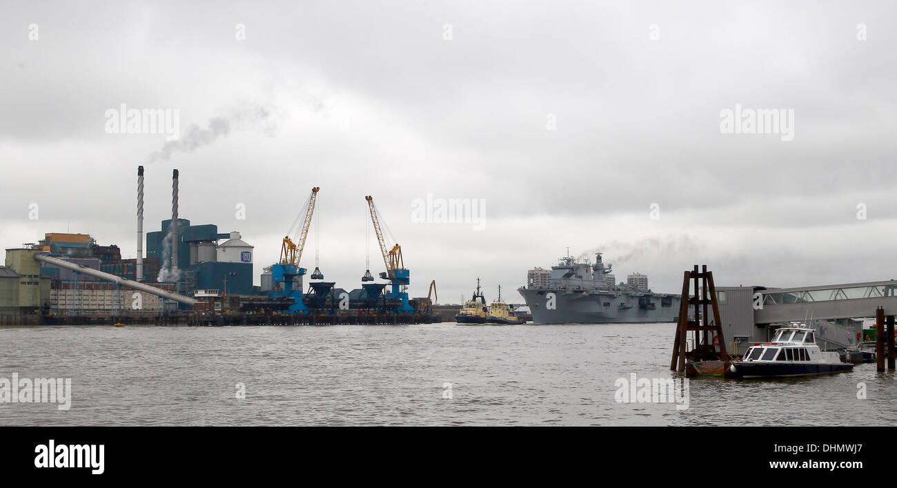 The HMS Ocean arrives in London through the Thames barrier. The ...