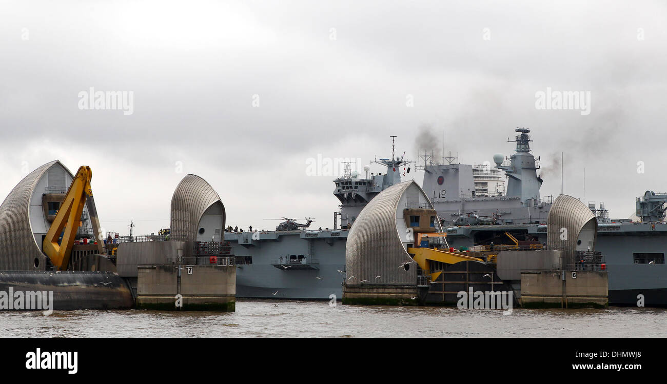 The HMS Ocean arrives in London through the Thames barrier. The ...