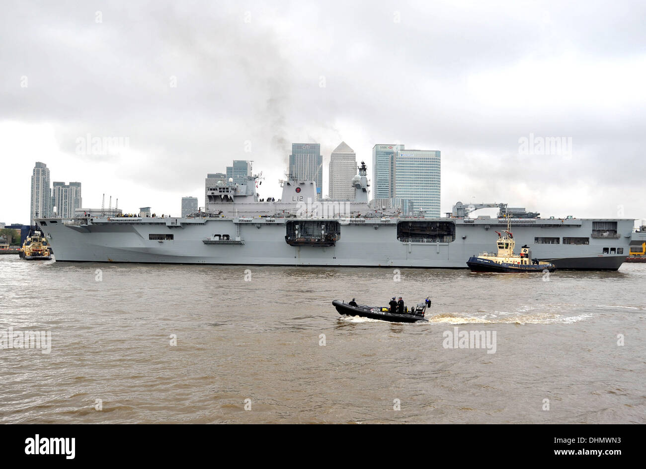 The HMS Ocean arrives in London through the Thames barrier. The ...