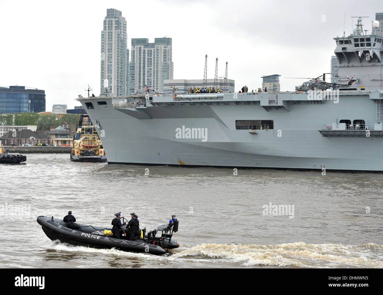 The HMS Ocean arrives in London through the Thames barrier. The ...
