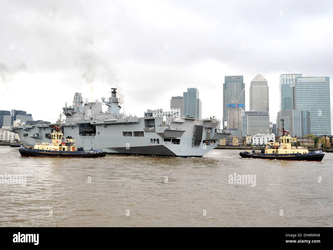 The HMS Ocean arrives in London through the Thames barrier. The ...