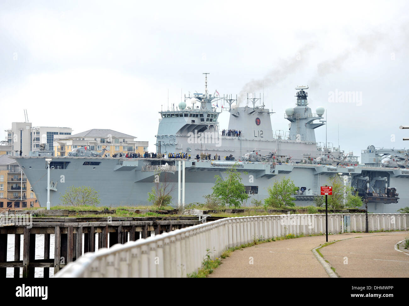 The HMS Ocean arrives in London through the Thames barrier. The ...
