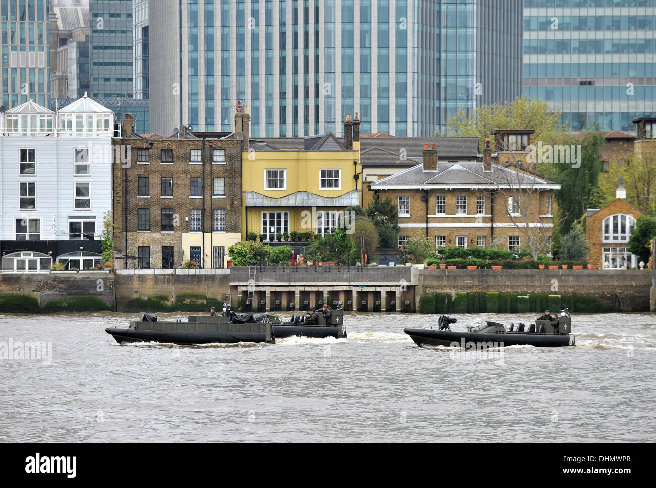 The HMS Ocean arrives in London through the Thames barrier. The ...