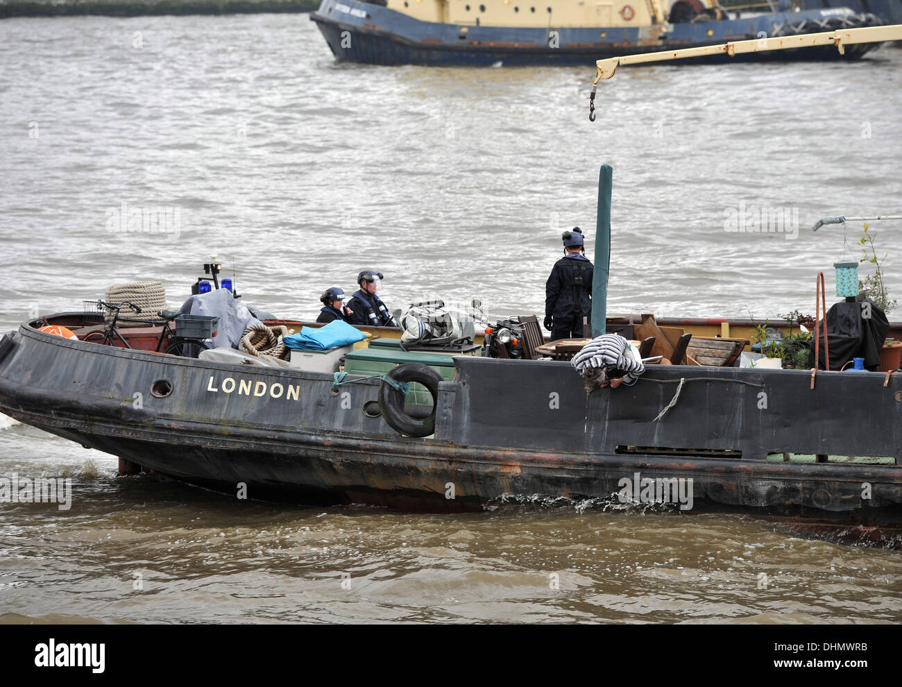 A police team boards a civilian ship that comes near the Royal Navy's ...