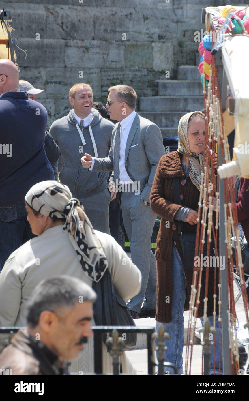 Daniel Craig talks to his stunt double during filming scenes from the ...