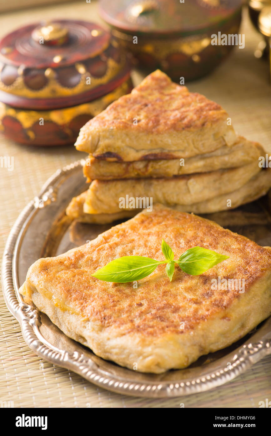 arab bread wrapped with cottage cheese and vegetables Stock Photo - Alamy