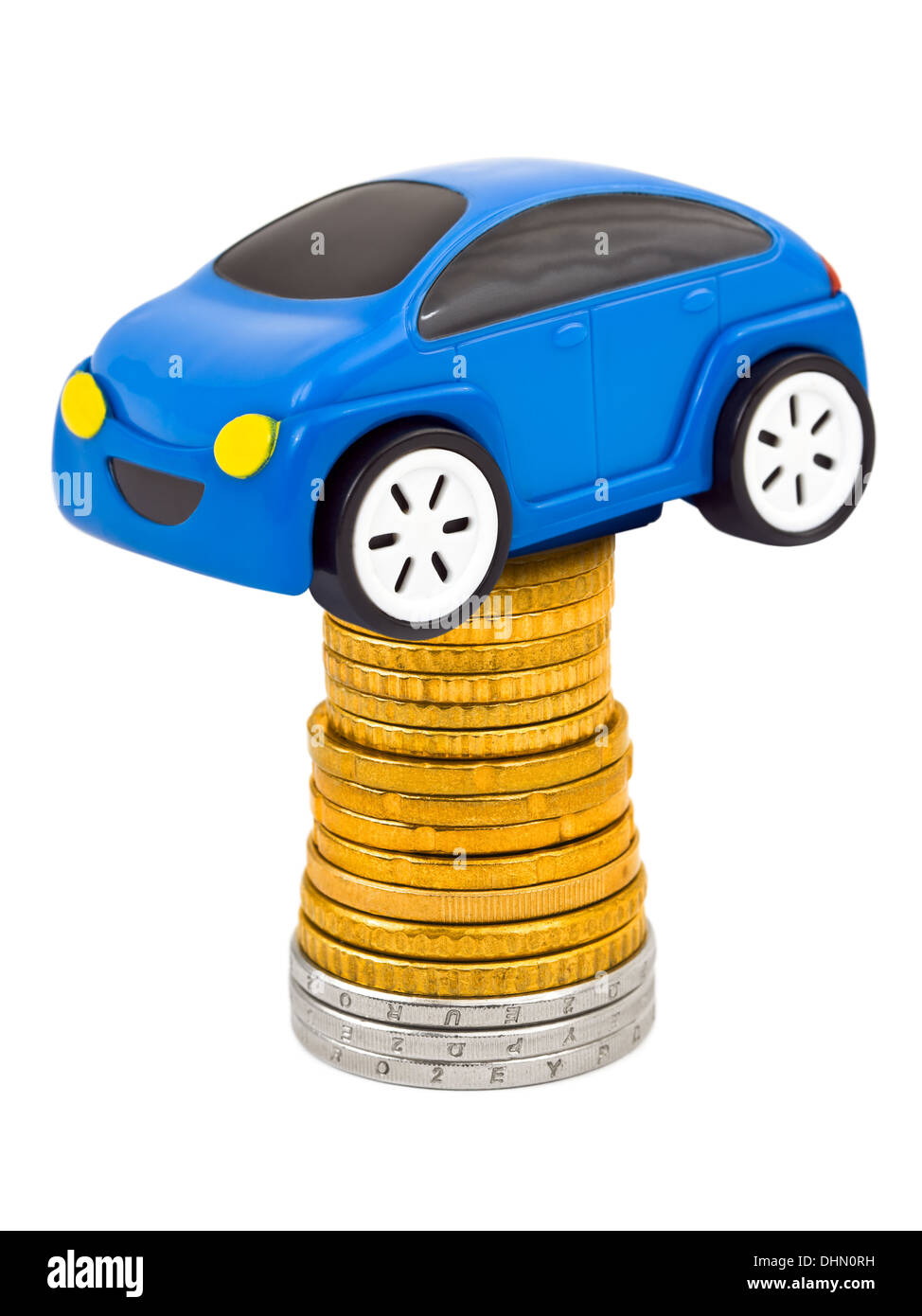 Toy car and stack of coins Stock Photo - Alamy