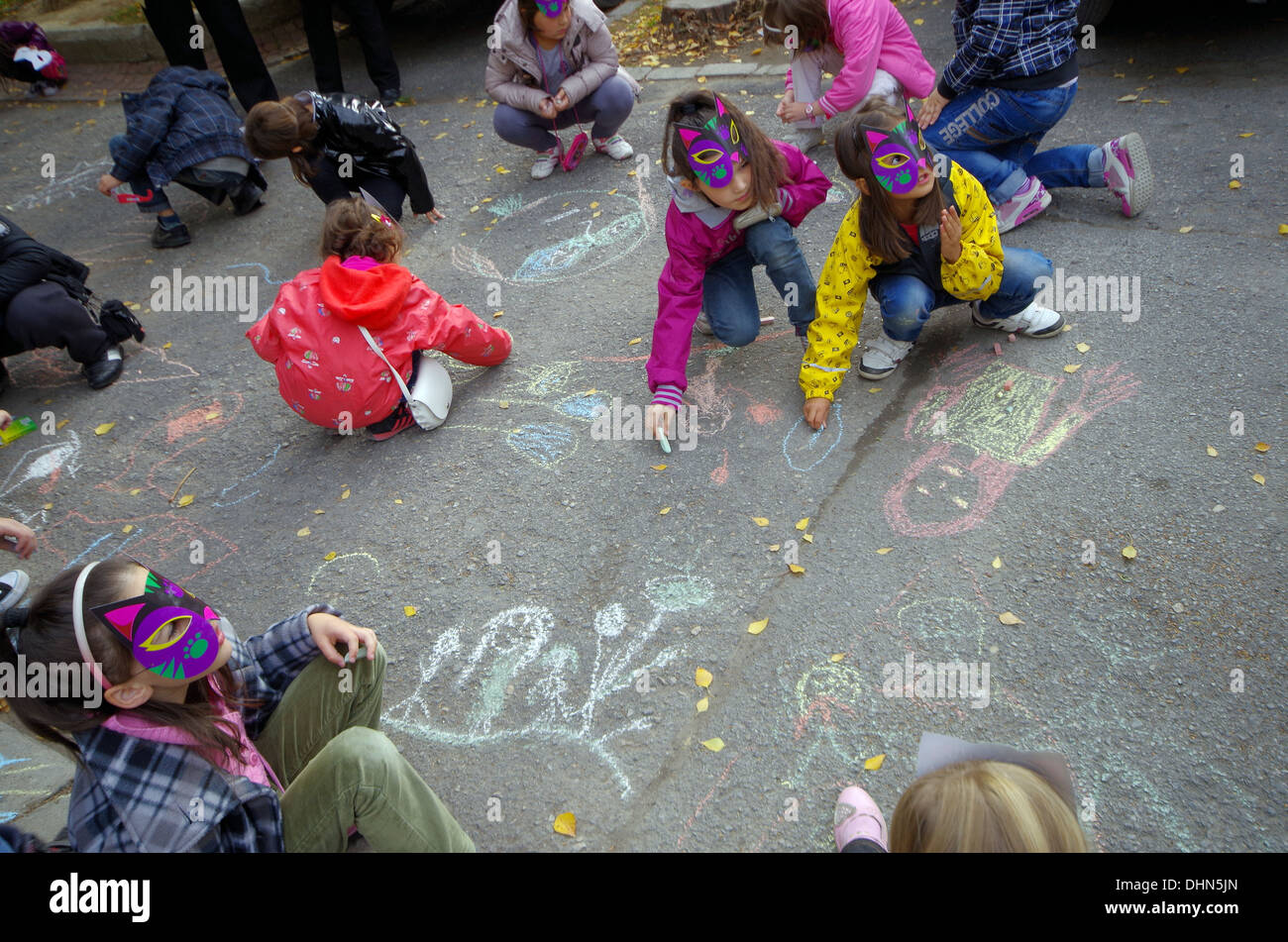 children painted on asphalt Stock Photo - Alamy