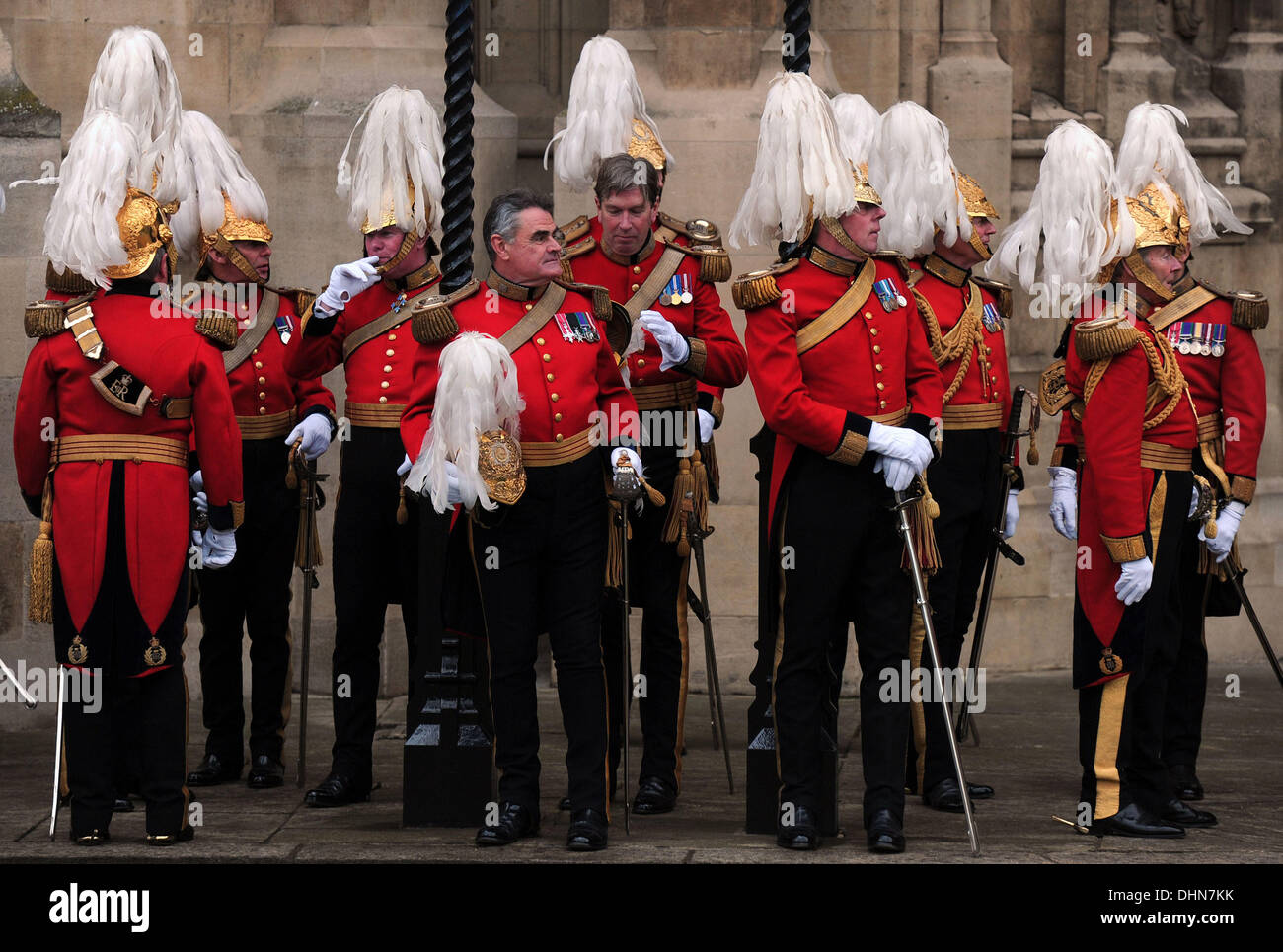 Members of the Royal Guard wait outside the Palace of Westminster ...