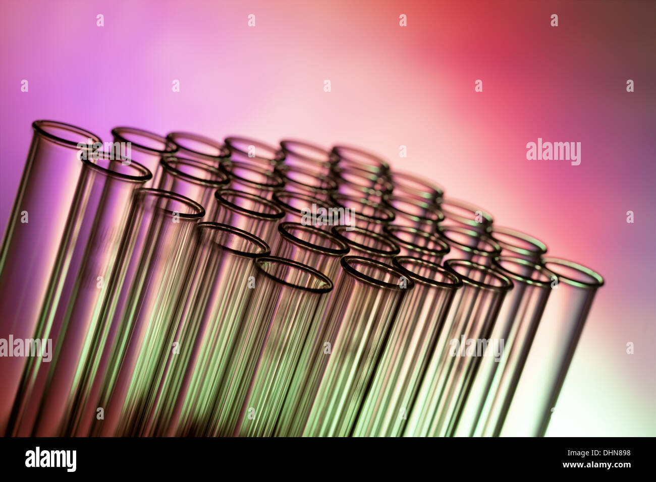 Chemical glass tubes on a colored background Stock Photo - Alamy
