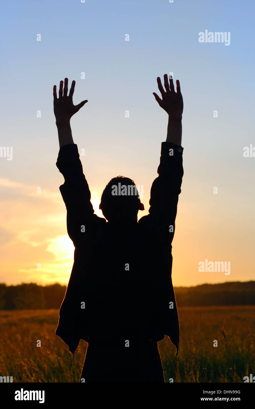 Man praying sunset hi-res stock photography and images - Alamy
