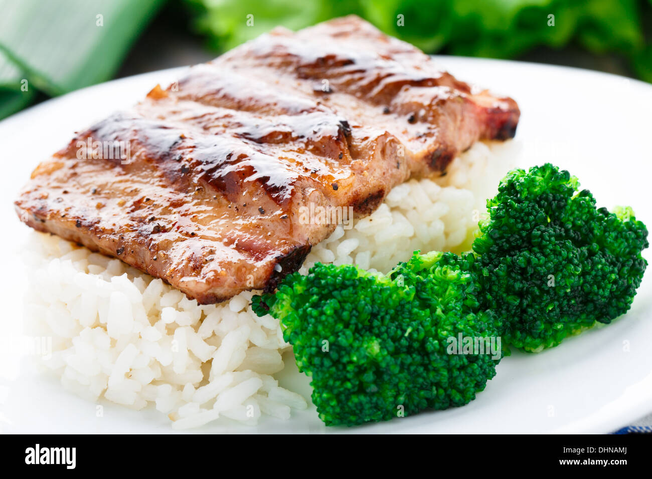 Grilled ribs with rice and broccoli Stock Photo - Alamy