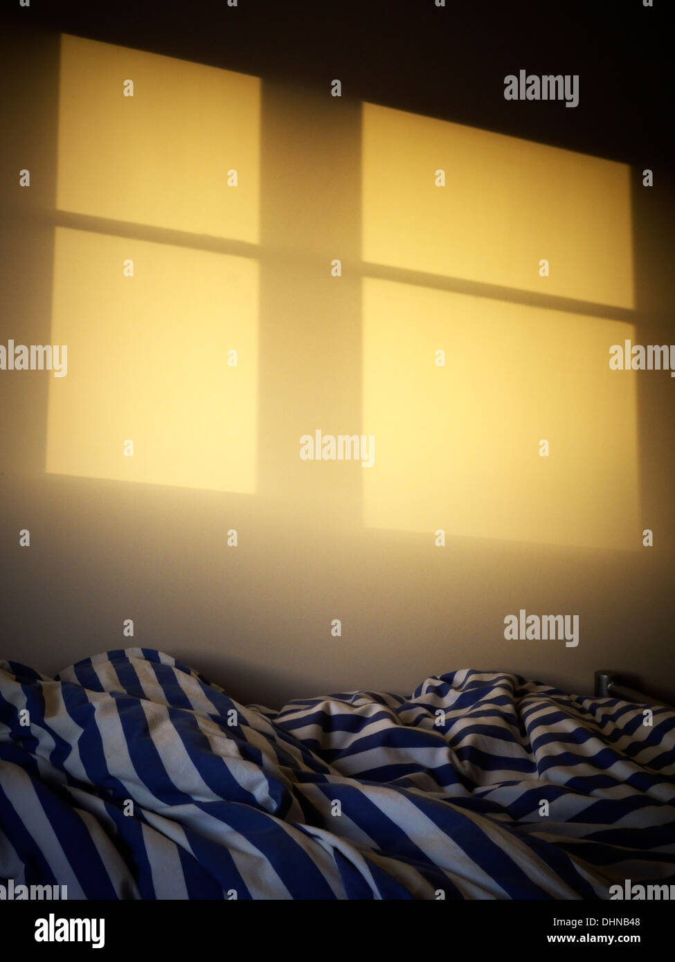 Sunlight through bedroom window Stock Photo - Alamy
