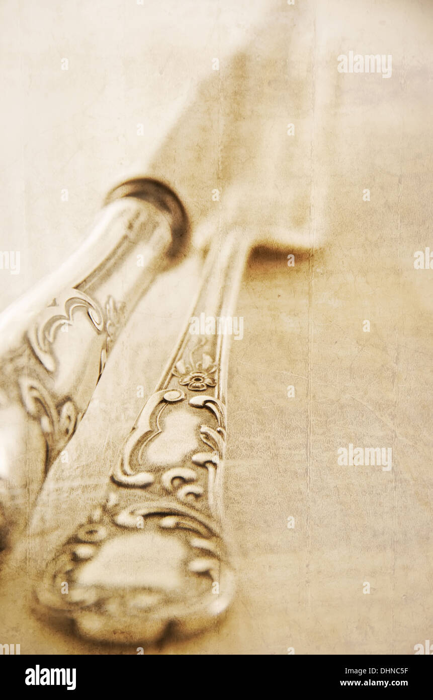 silver cutlery in antique colour Stock Photo - Alamy