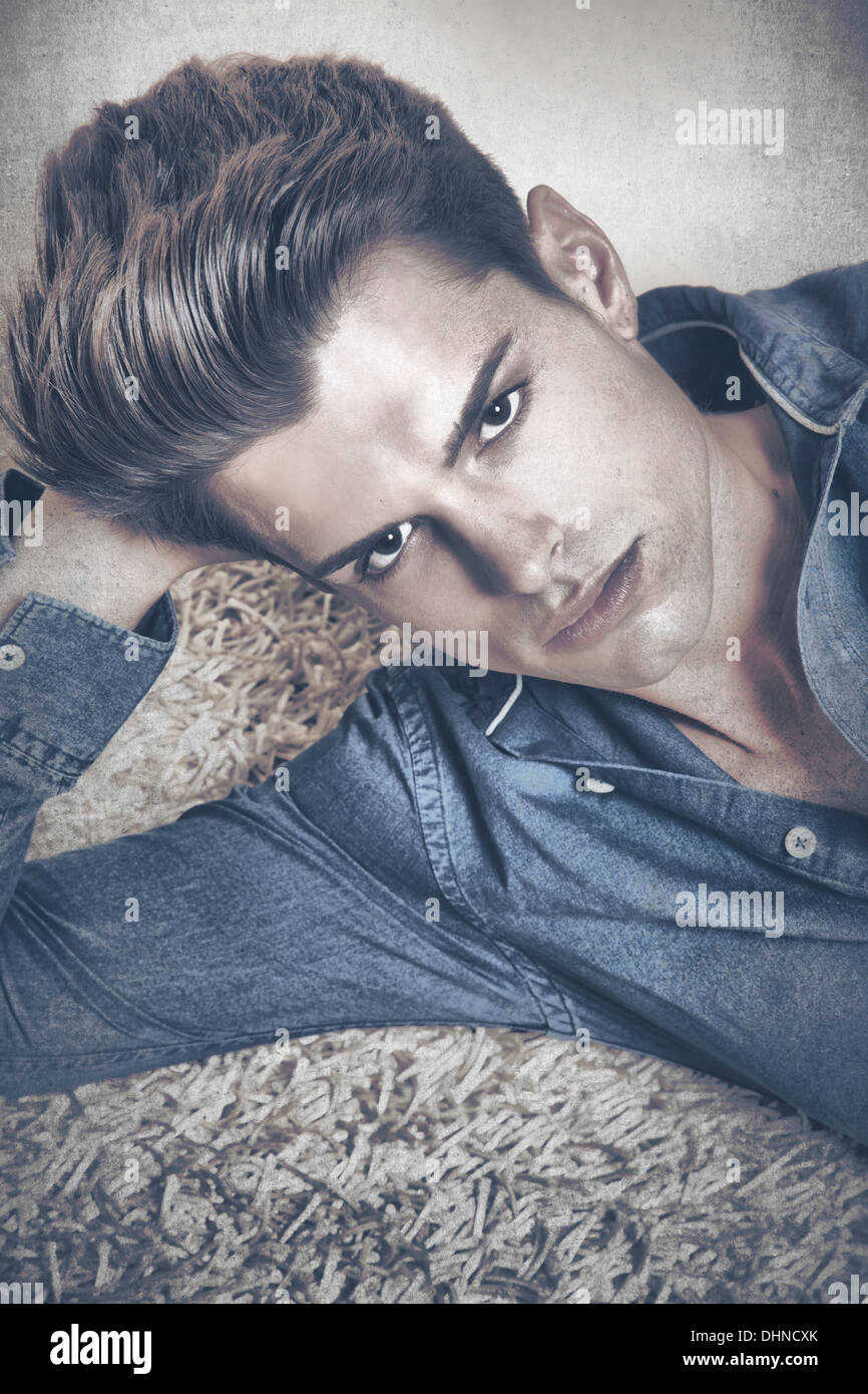 Seductive Man Reclining Stock Photo - Alamy