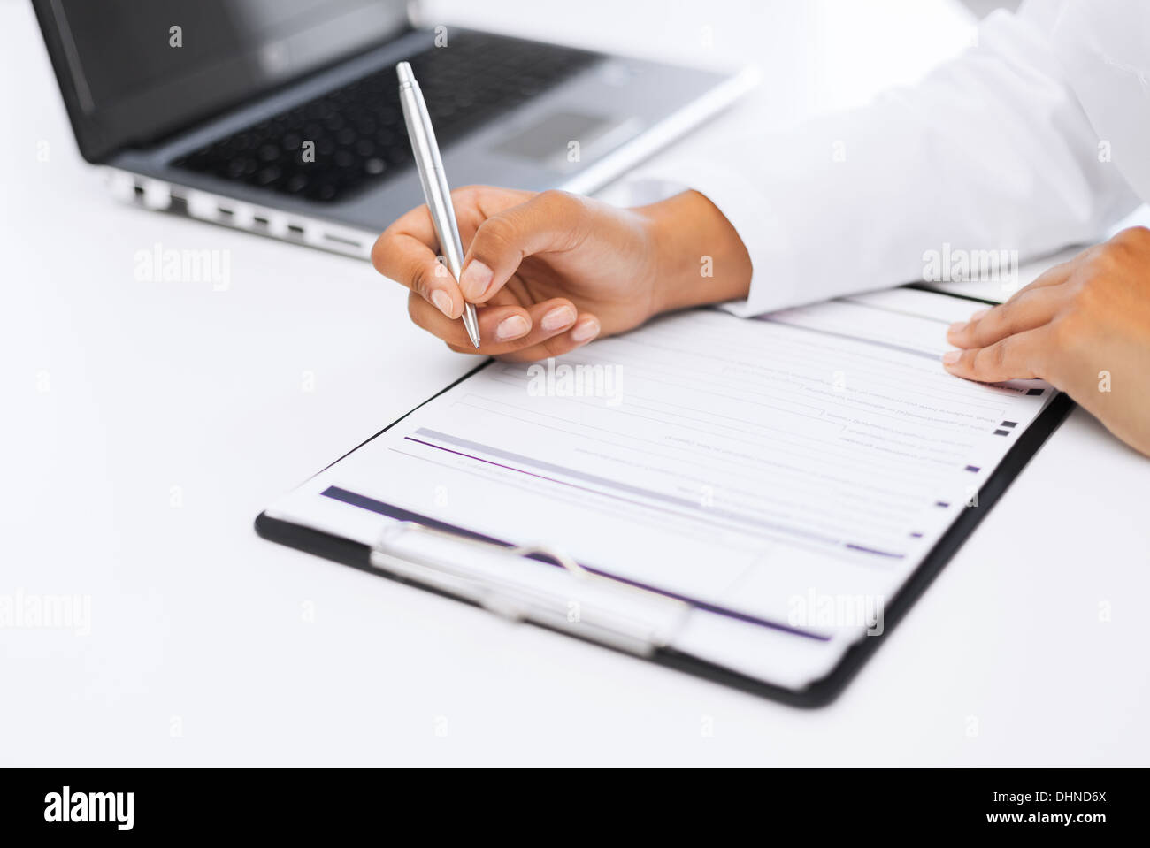 female doctor writing prescription Stock Photo - Alamy