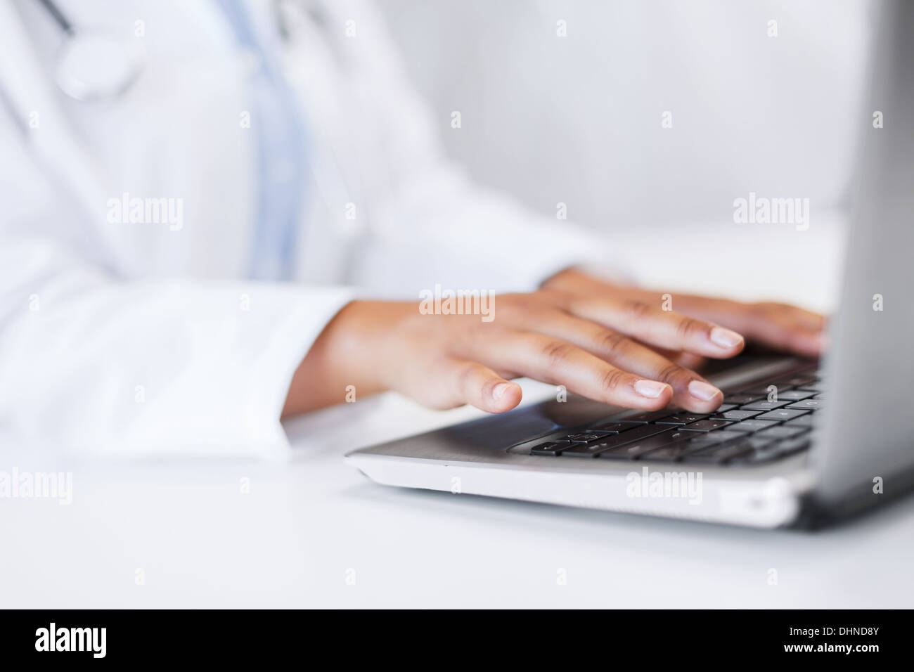 female doctor using her laptop computer Stock Photo - Alamy